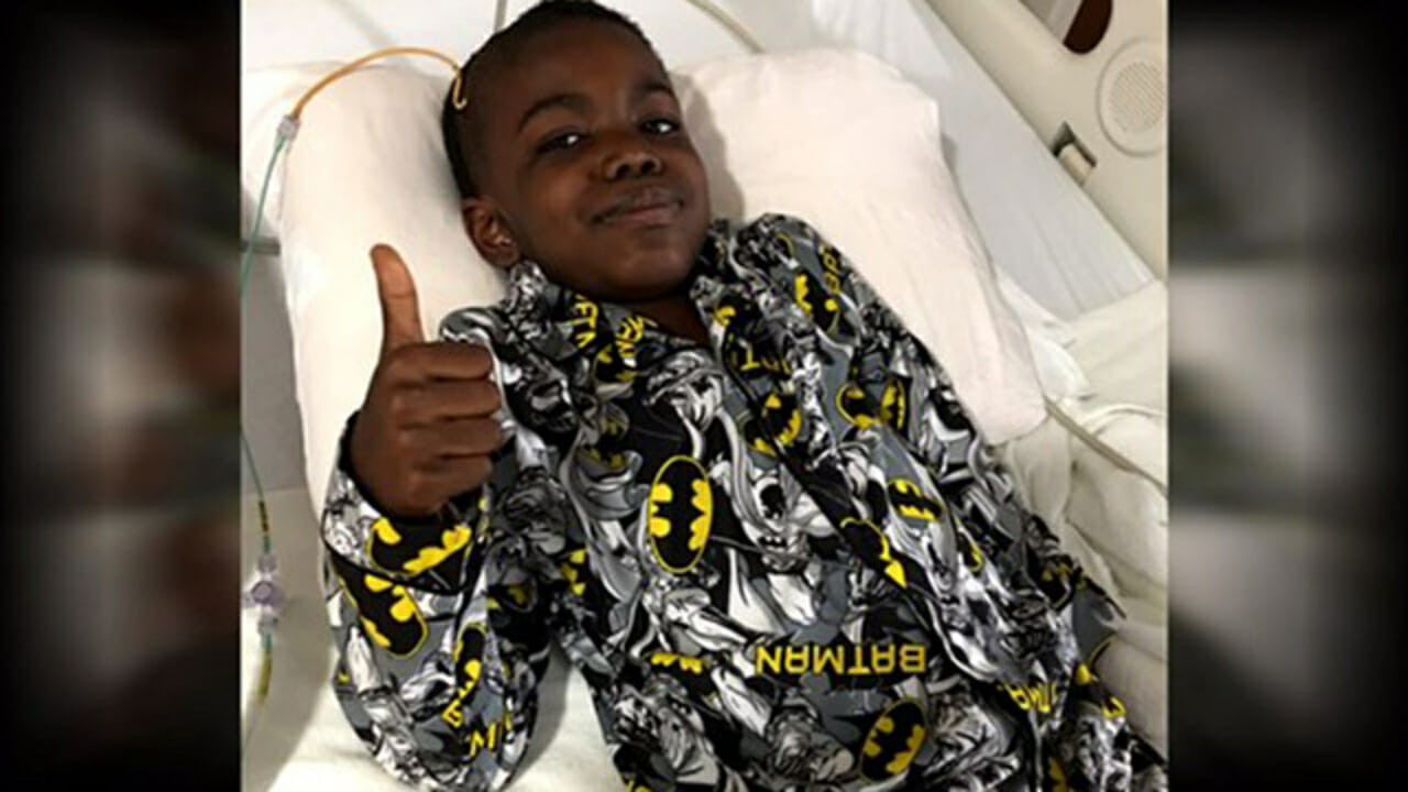 8-year-old boy celebrates after beating stage 4 brain cancer