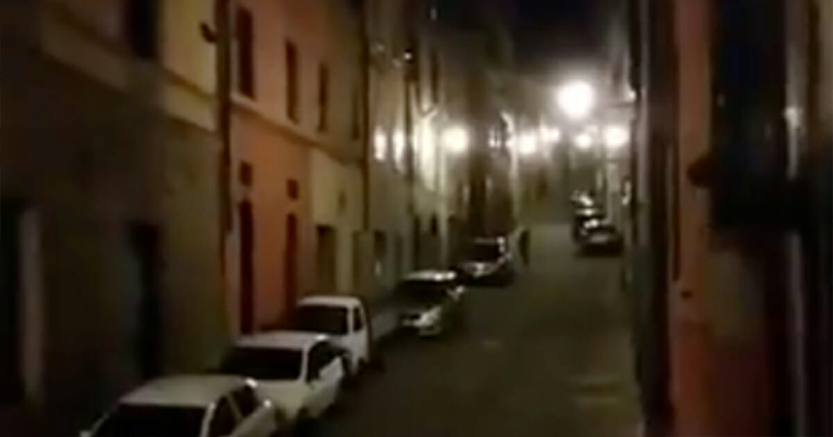 Quarantined Italians sing together from their windows across empty streets