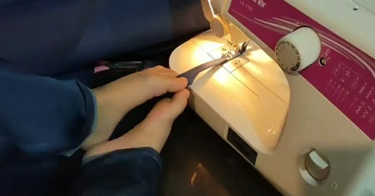 Woman born without arms makes masks using sewing machine with feet