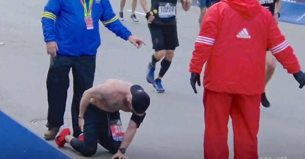 Veteran marine drags himself across marathon finish line on hands