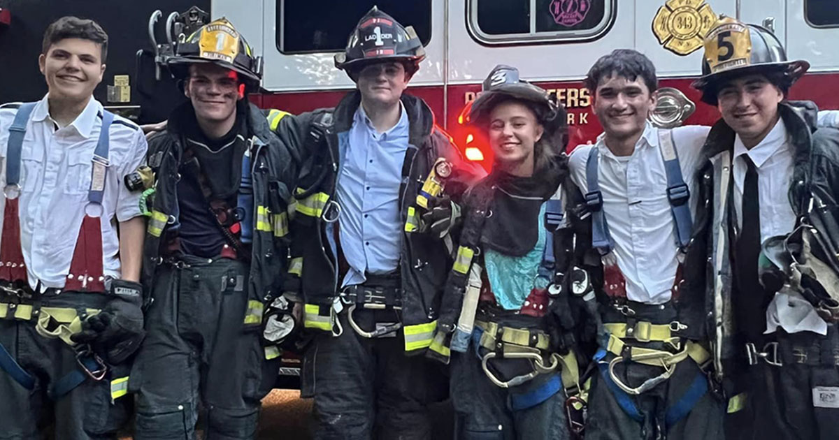 High school students rush from graduation to fight fire in community